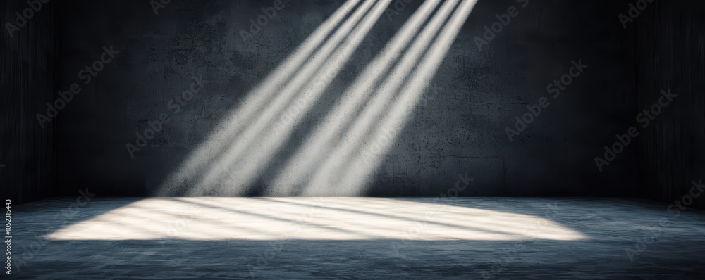dimly lit room with dramatic light rays casting shadows on textured ...