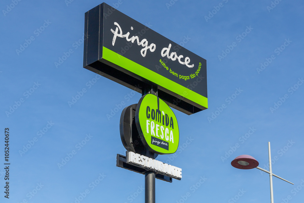 Pingo doce logo sign. Pingo Doce is the largest supermarket chain in ...