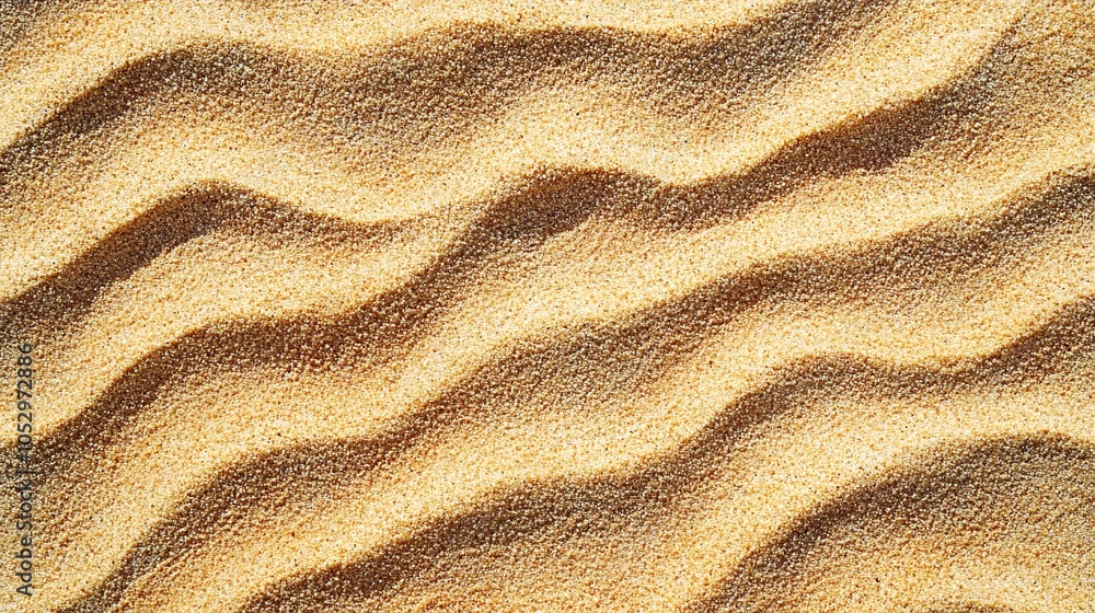 2410 84.A top view of sand with crisscrossing tracks, creating an ...
