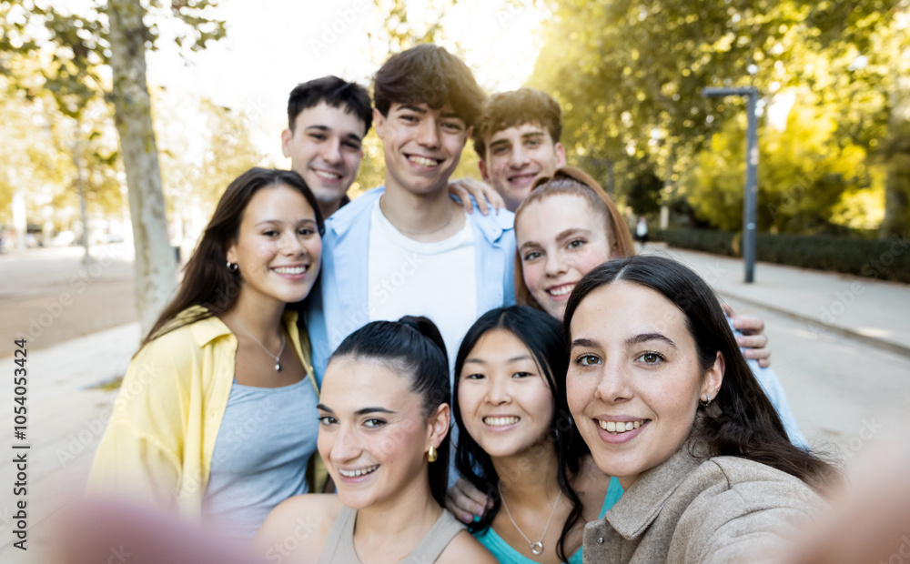 A group of 8 young people of different ethnicities between 18 and 25 ...