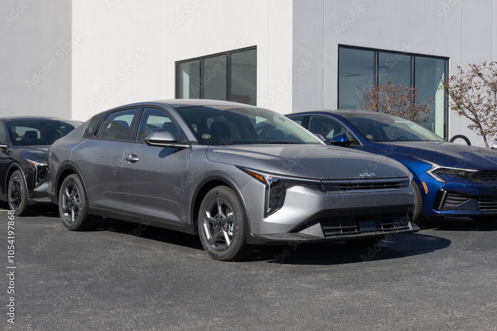 Kia K4 LXS Sedan display at a dealership. Kia offers the K4 with a 2.0L ...