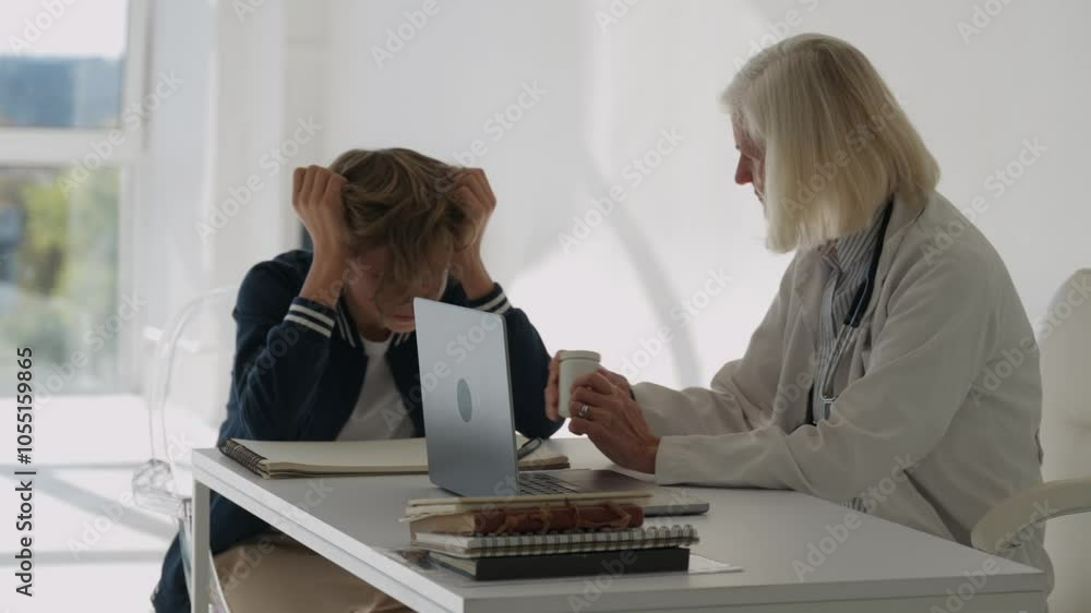 teenager teenage boy male getting medical help, teen man at a doctor's ...