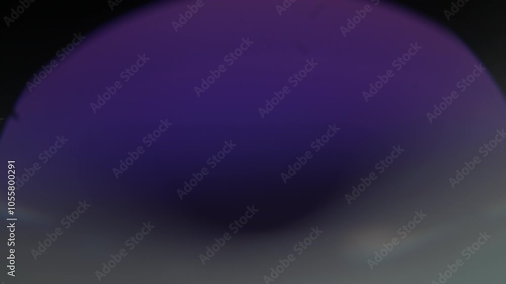Colorful lens flares overlays fading out into black background. Slow ...