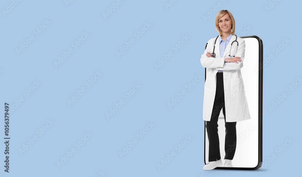 Online medical consultation. Doctor on smartphone screen against light ...