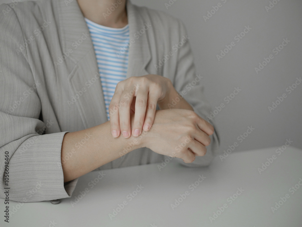 A young businesswoman has severe pain in her wrist. She has numbness ...