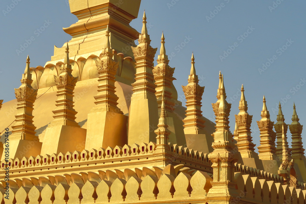 The many little towers, turrets of the big golden stupa of Pha That ...