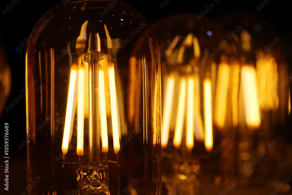 Light bulbs with big yellow filaments inside in vintage style Stock ...