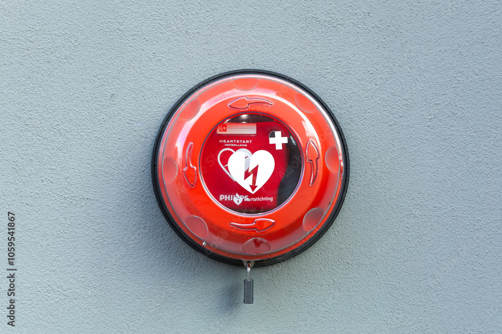 AED heartstart defibrillator mounted on the wall. An AED, or automated ...