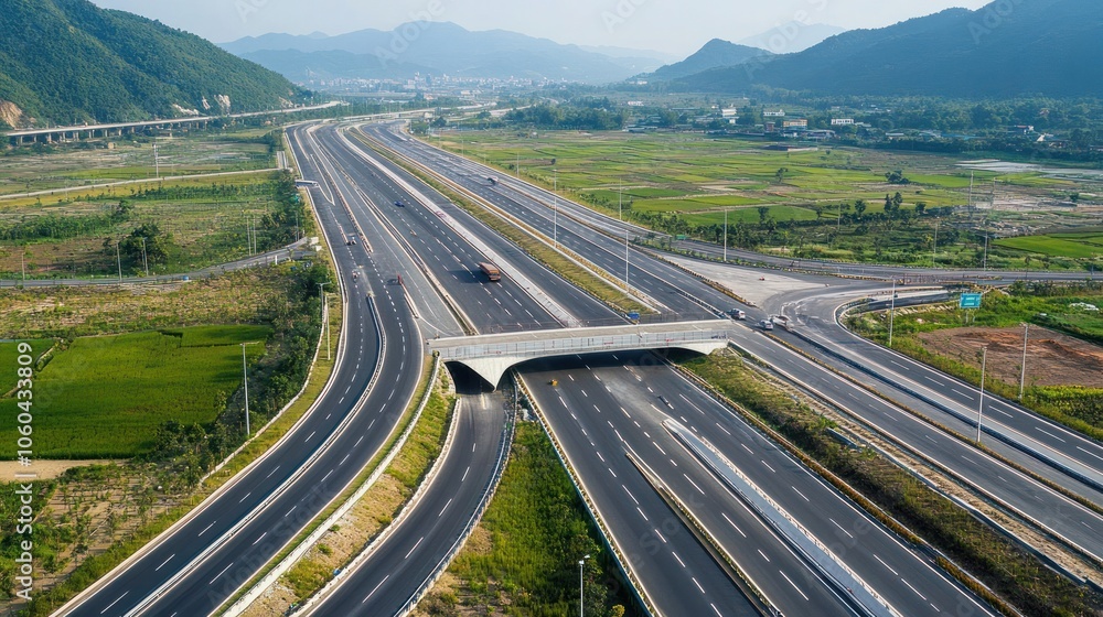 Aerial perspective of a highway intersection with multiple lanes ...