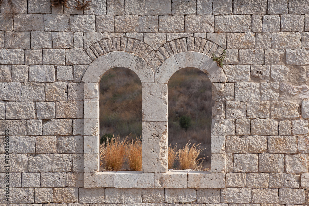 Window in an old wall. Window in an old wall. Remains of a fortress ...