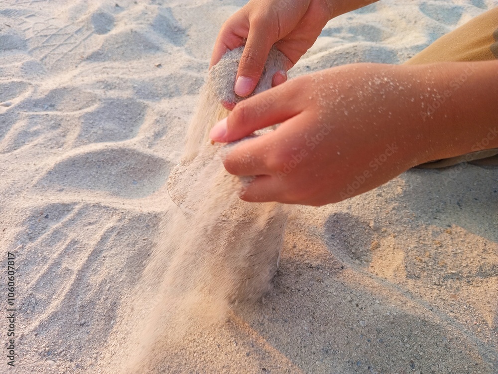 playing in the sand. Hands and feet on sand. feet on the beach. Stock ...