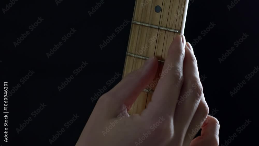 A closeup and detailed view of a guitar fretboard showcasing its ...