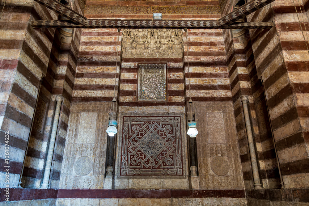 Ornate entrance vestibule of the historic Sultan Hassan Mosque and Madrassa in Islamic Cairo ...