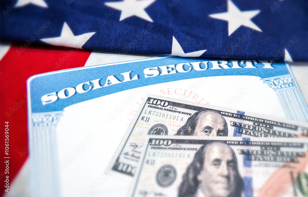 Social Security card is placed on the American flag, background. Social ...