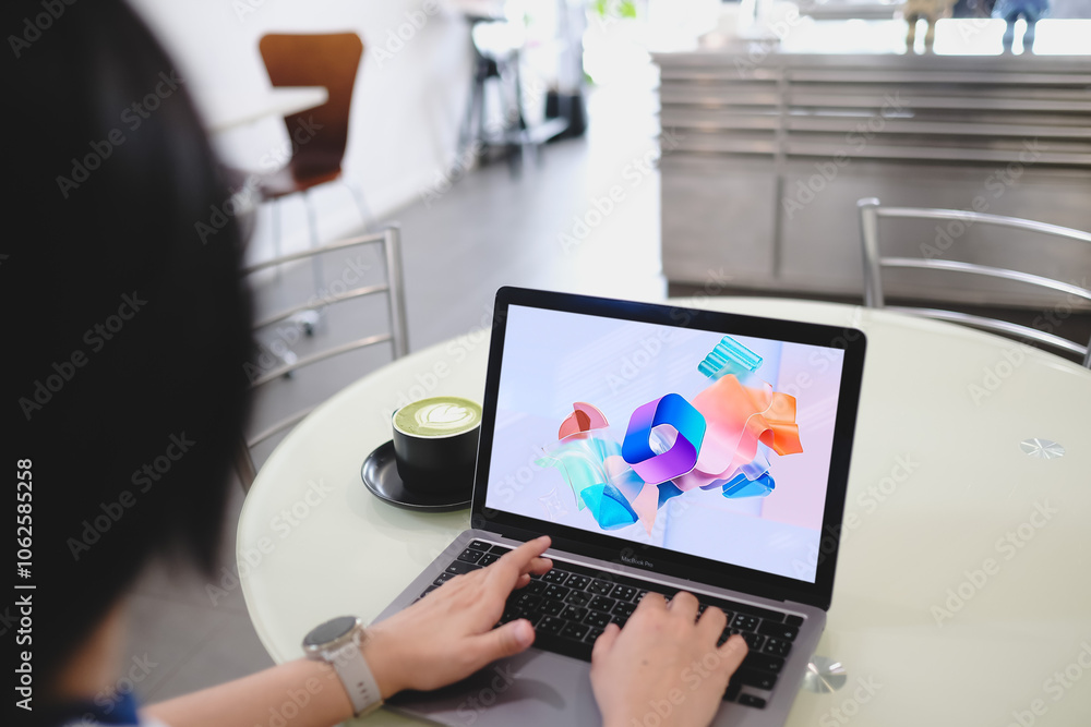 Bangkok. Thailand. November 5,2024 :A man useing laptop computer and ...