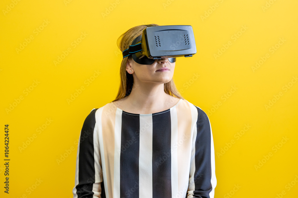 Young Woman Wearing A Virtual Reality Device Viewing A Virtual World