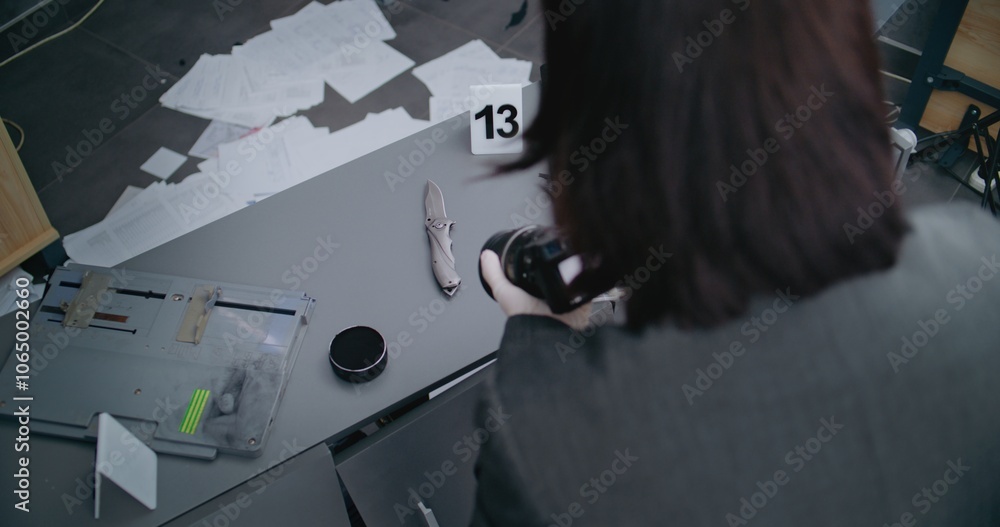 Robbery or murder case: Top view on female criminalist taking photos of ...
