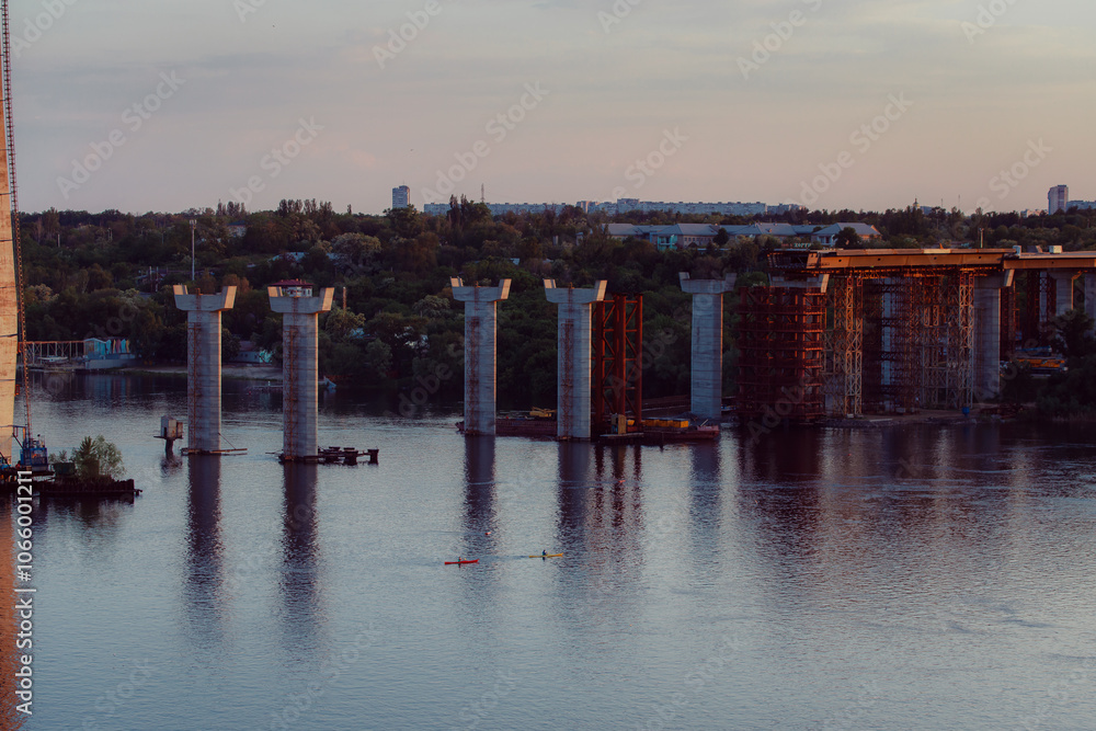 Concrete bridge over the river. Complex technical projects. A large ...