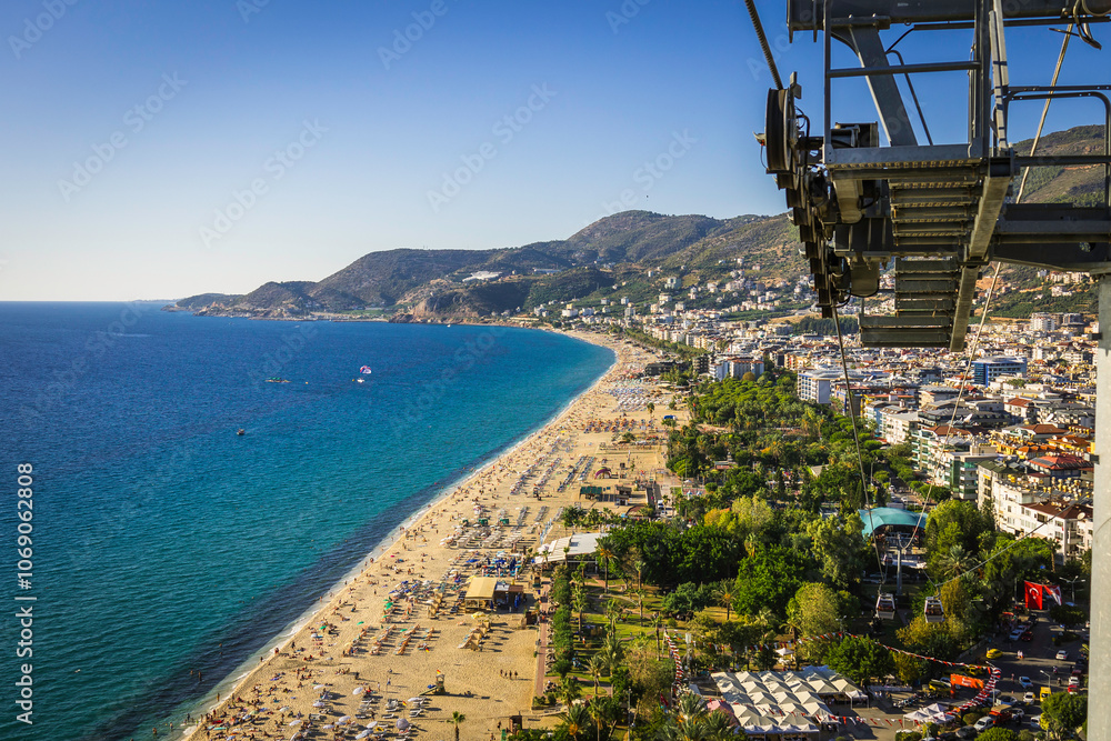 Alanya castle top view on the mountain with coast ferry boat on blue ...
