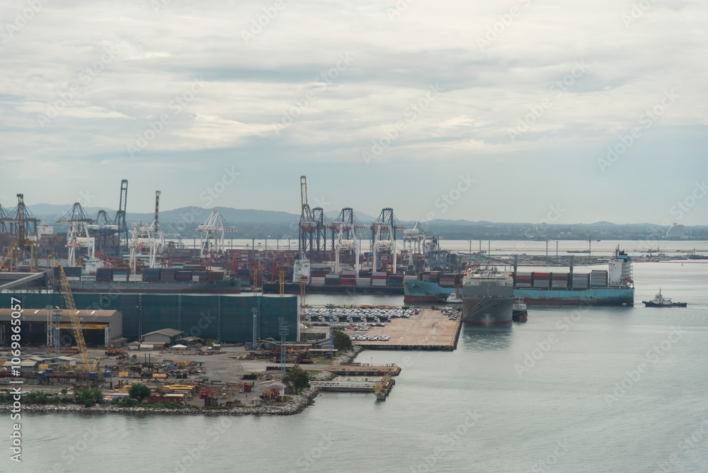 container ship commercial vessel alongside in port for loading and ...