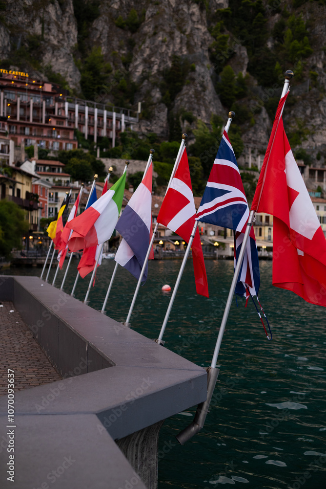 National flags of the European countries against the lake Garda Stock ...