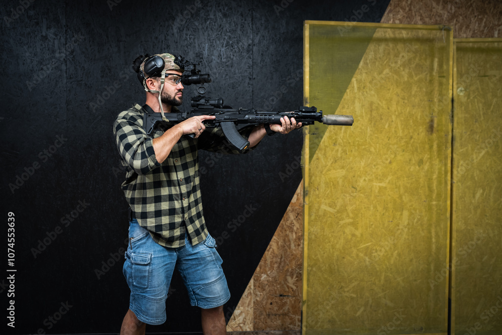 A private military in civilian clothes practices tactical shooting with ...