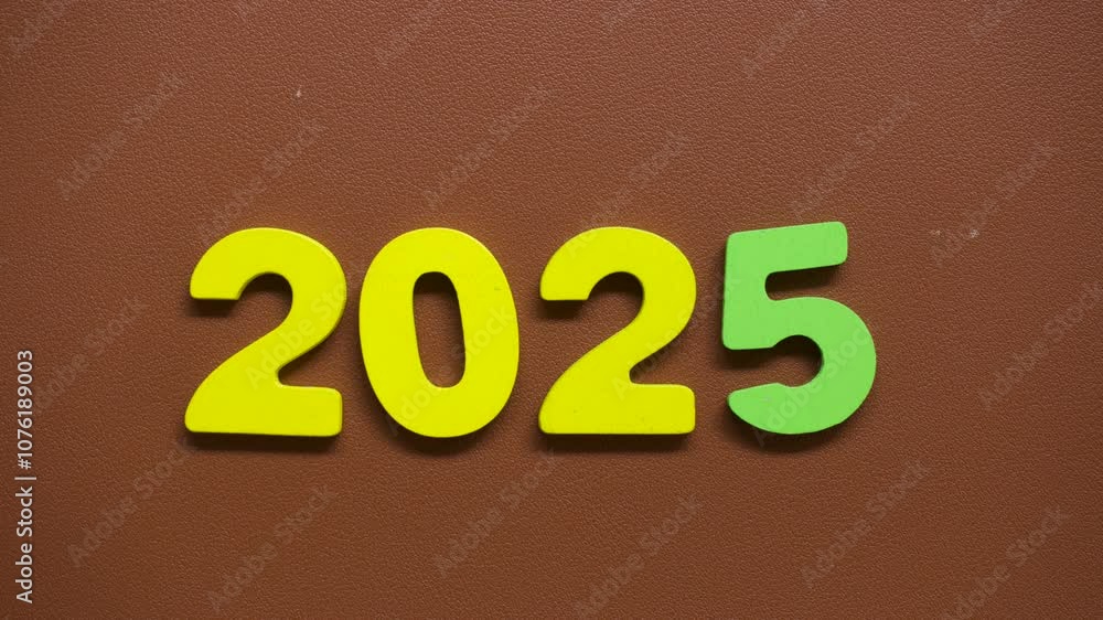 Stop motion sequence showing the colorful numbers "2025," with yellow ...