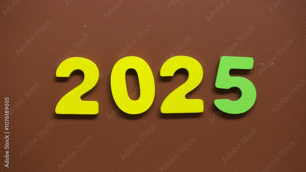 Stop motion sequence showing the colorful numbers "2025," with yellow ...