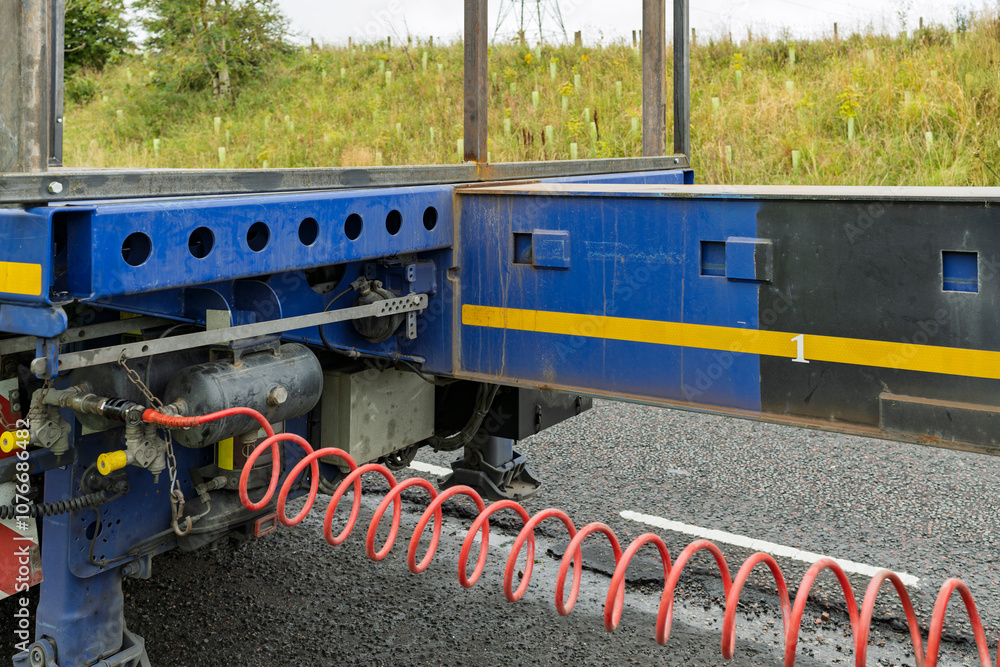 Blue HGV lorry truck extendable flatbed trailer being extended at ...