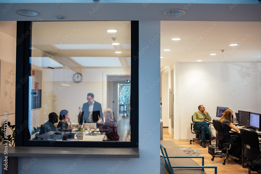 Team collaboration in modern office space with diverse professionals ...