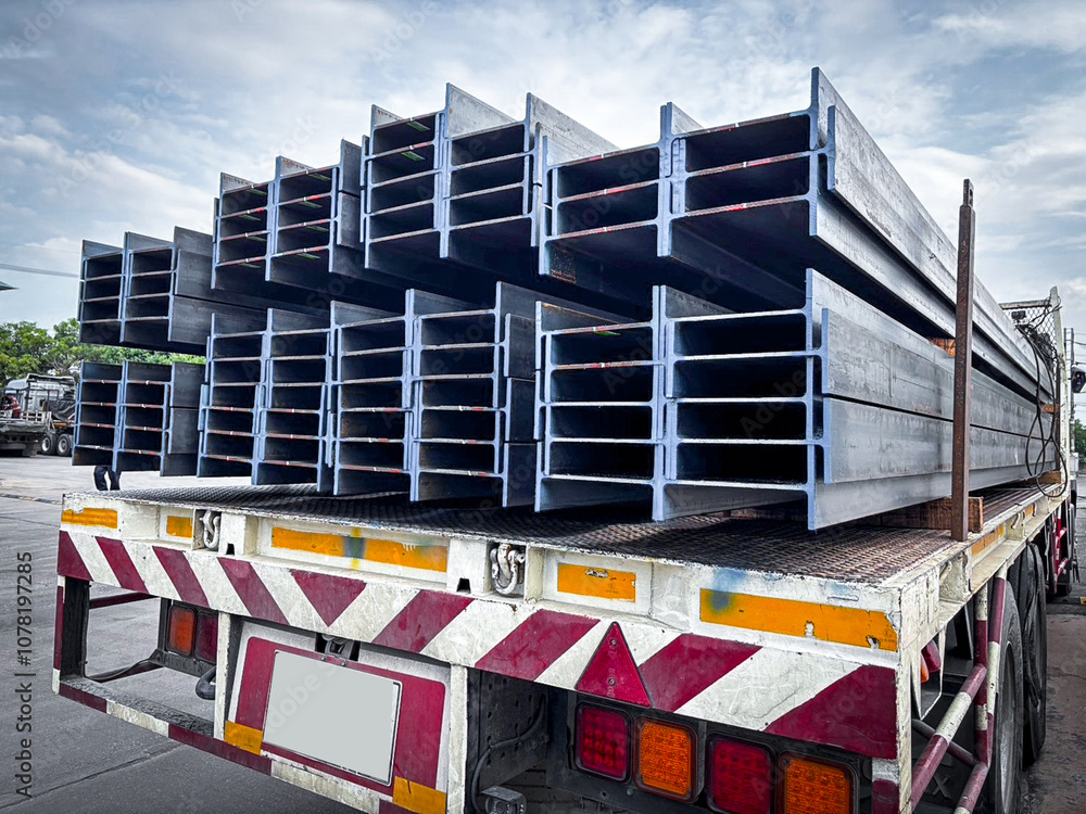 Metal profile beam in packs at the warehouse of metal products.Steel I ...