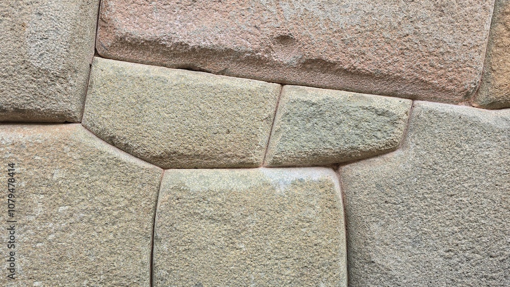 Bricks of masonry in stone wall built by the ancient Inca Empire ...