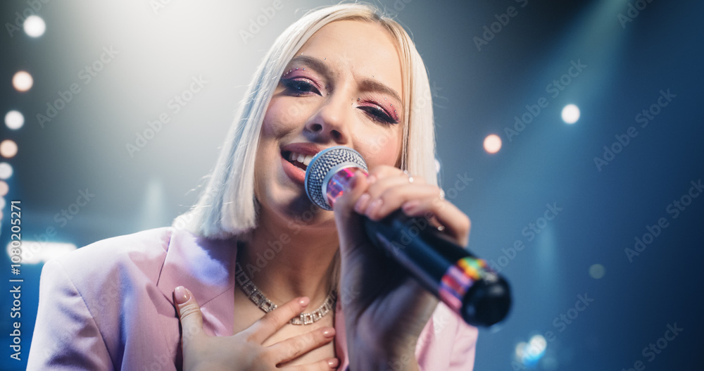 Portrait of a Beautiful Female Artist Standing on Stage at a Concert ...