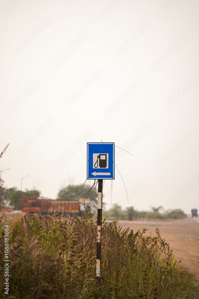 Foto de fuel station ahead sign, roadside gas station direction ...