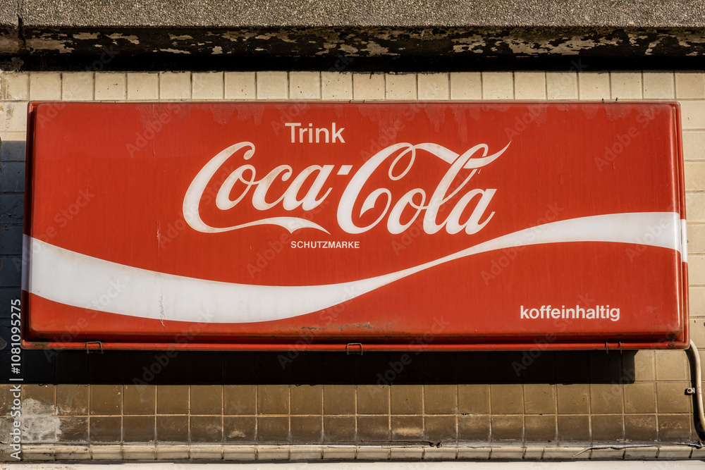 Hamburg, Germany - 10 11 2024:close-up of an old neon sign with coca ...