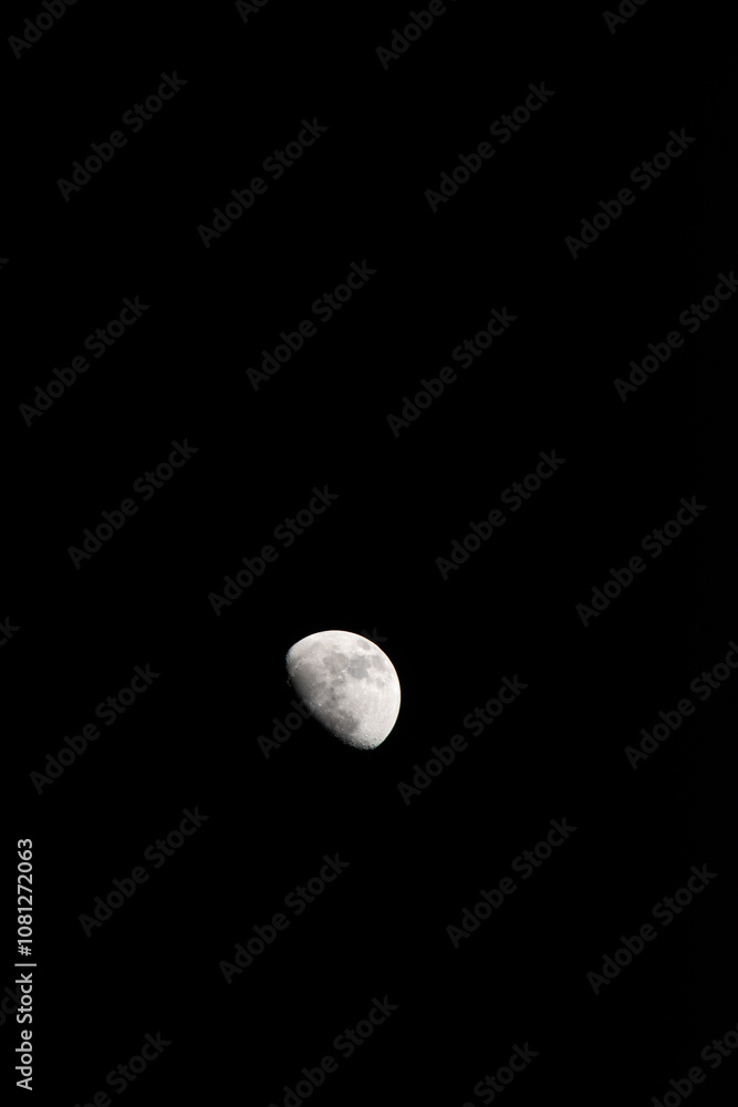 High-resolution image of the waxing moon in a dark sky, highlighting ...