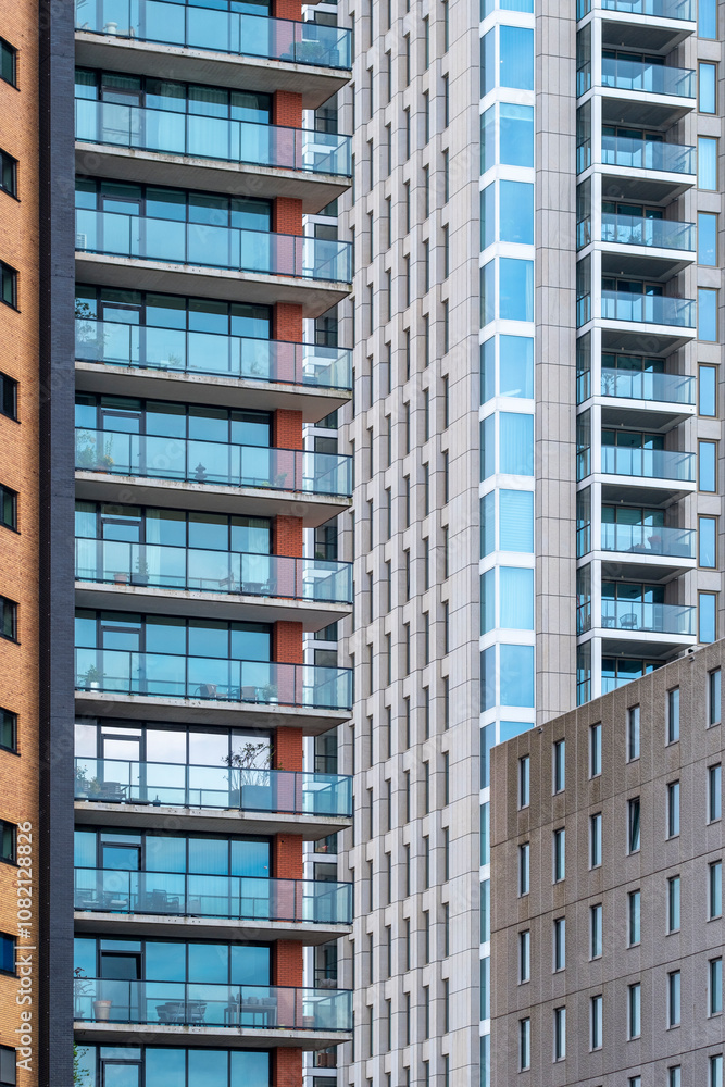 A collection of modern high-rise residential buildings with sleek ...