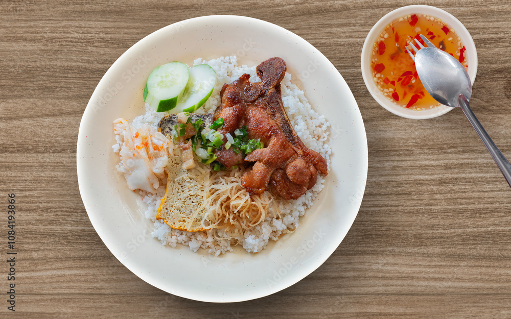 Broken rice with grilled pork chop, meatloaf and shredded pork skin ...
