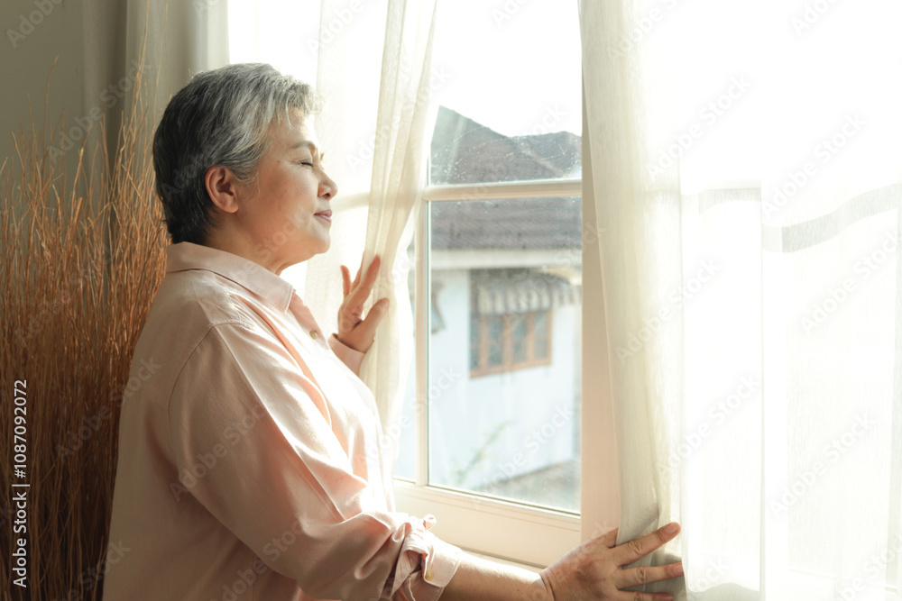 Happy Asian senior woman at home, cheerful mature standing by the ...