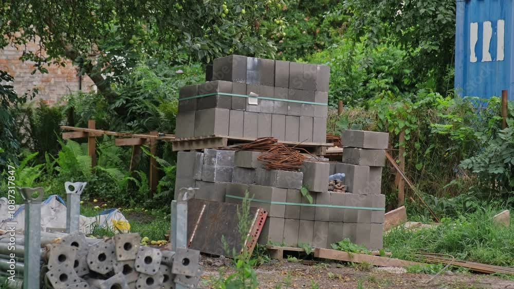 Stack of Concrete Cinder Block Bricks and Metal Rebar Stirrup Stored ...