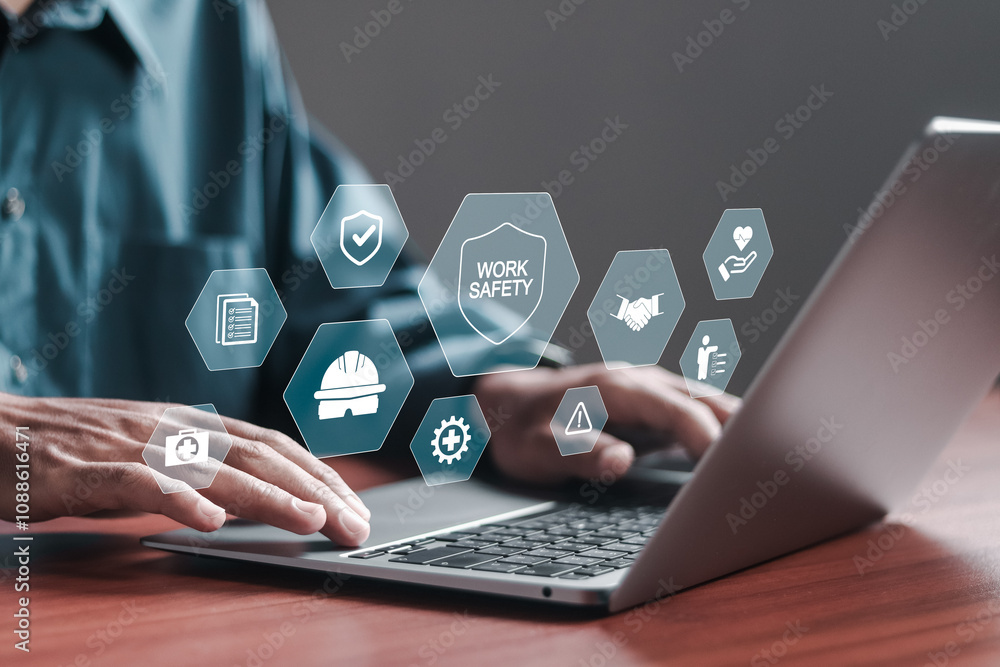 Work safety concept. Businessman use laptop with safety icons on ...