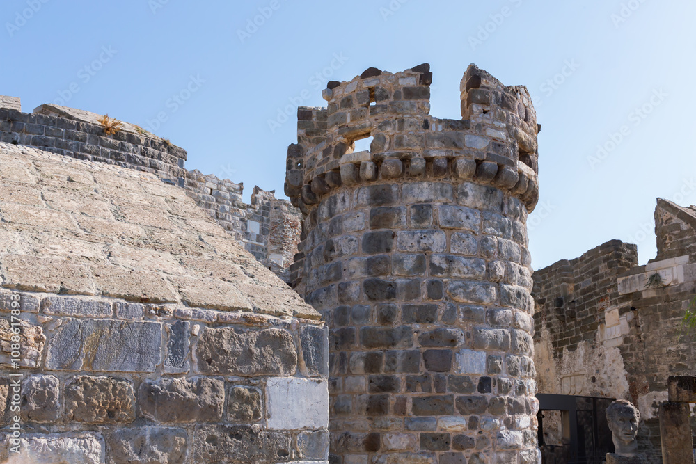 Stone turret and battlements of Bodrum Castle of St. Peter, showcasing ...