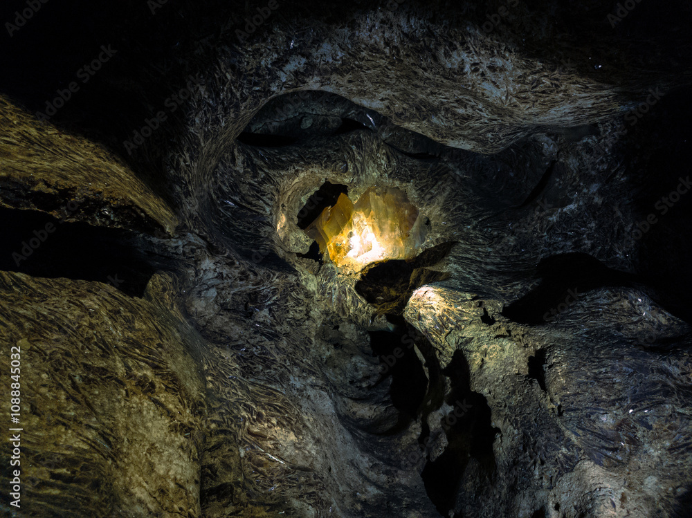Gypsum cave with deep tunnels. Old abandoned galleries underground ...