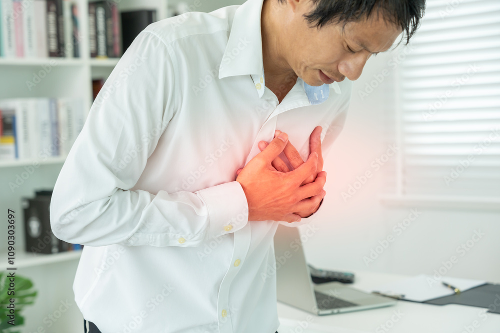 hand hold chest with heart attack symptoms, asian man working hard have ...