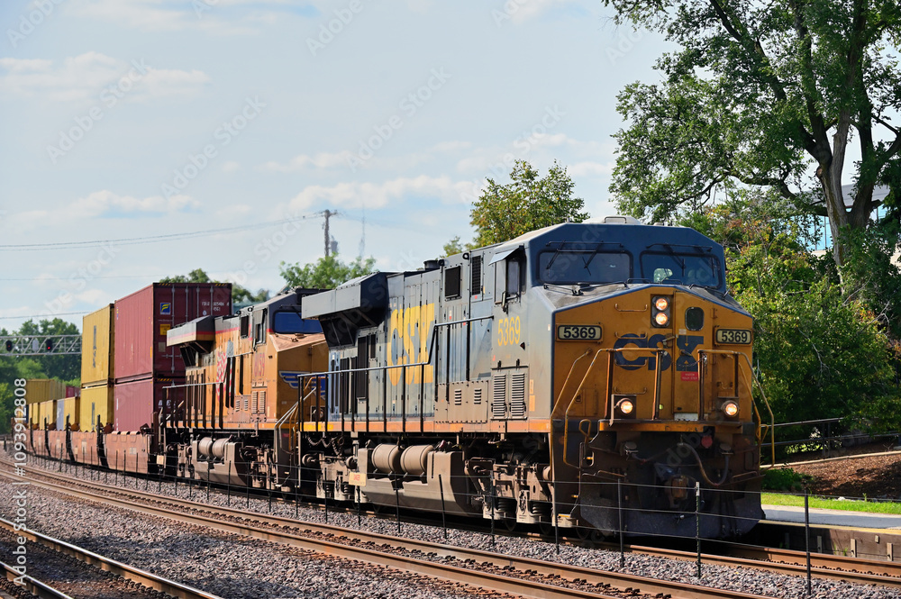 Multiple locomotives, including an off-road CSX Transportation unit ...