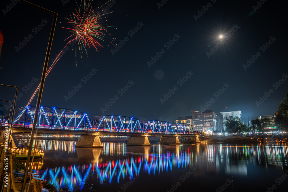 fireworks show at iron bridge across ping river where decorate with a ...