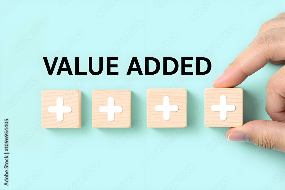 Value Add Concept. A hand placing a wooden cube with a plus sign on a ...