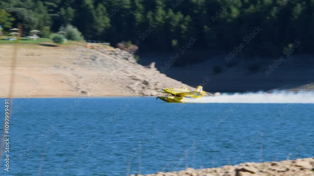 Air Tractor AT-802A aircraft adapted for aerial firefighting collecting ...