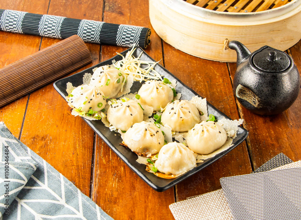 steamed stinky tofu soup dumplings served in tray dish isolated on ...