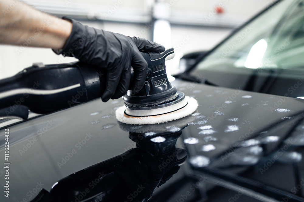 Car detailing and polishing process. Hands of professional car service ...